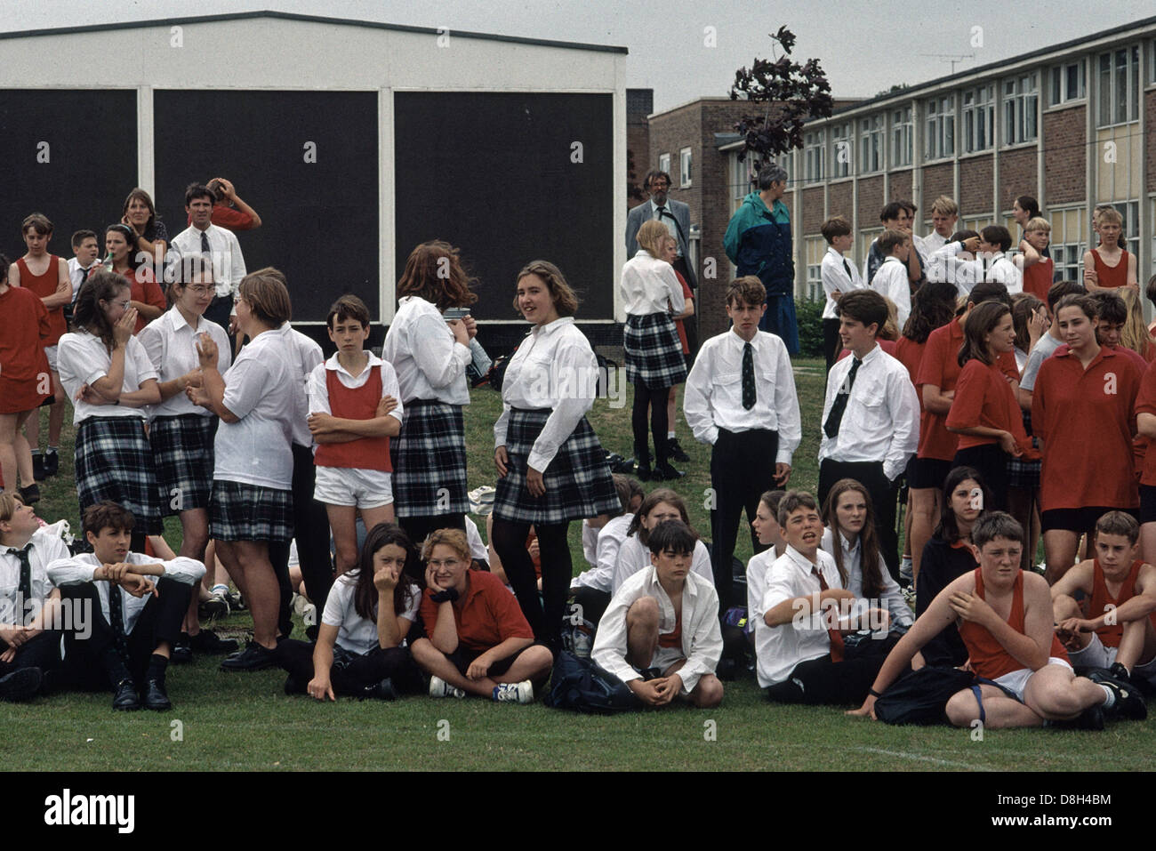 secondary school children spectators at their sports day event Stock ...