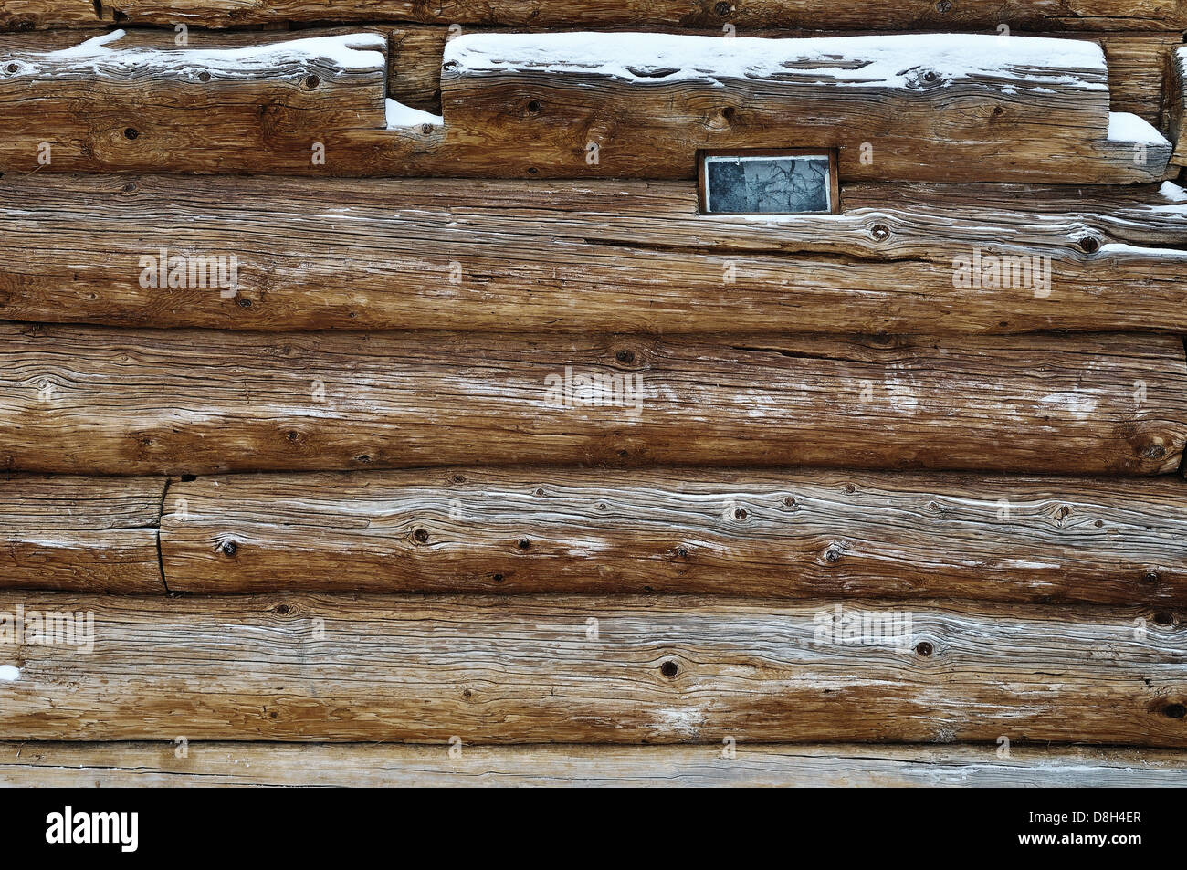 Log wall and window Stock Photo - Alamy
