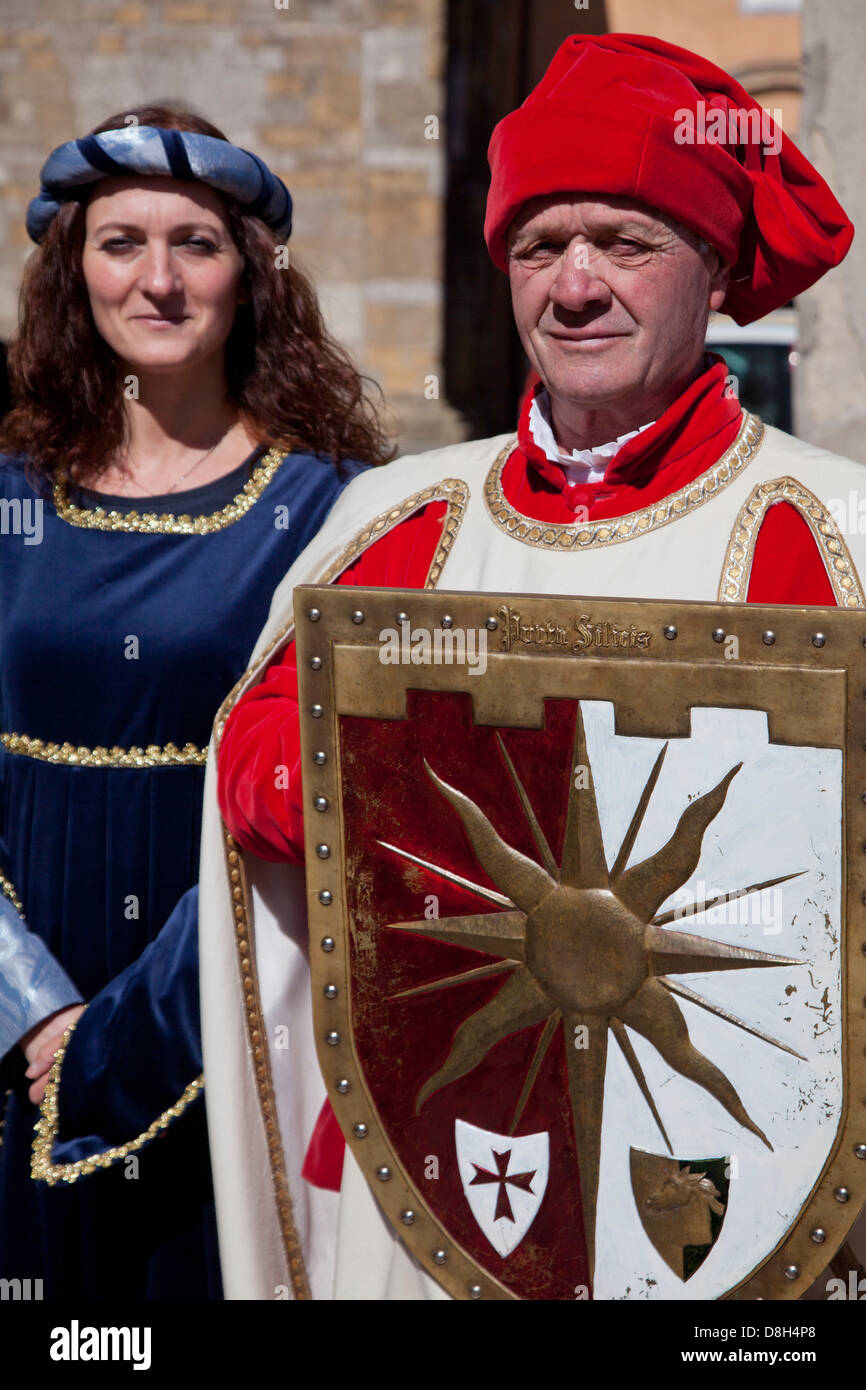 Local people in medieval costumes during traditional crossbow palio ...