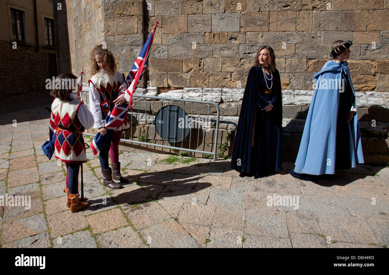 Local people in medieval costumes during traditional crossbow palio ...