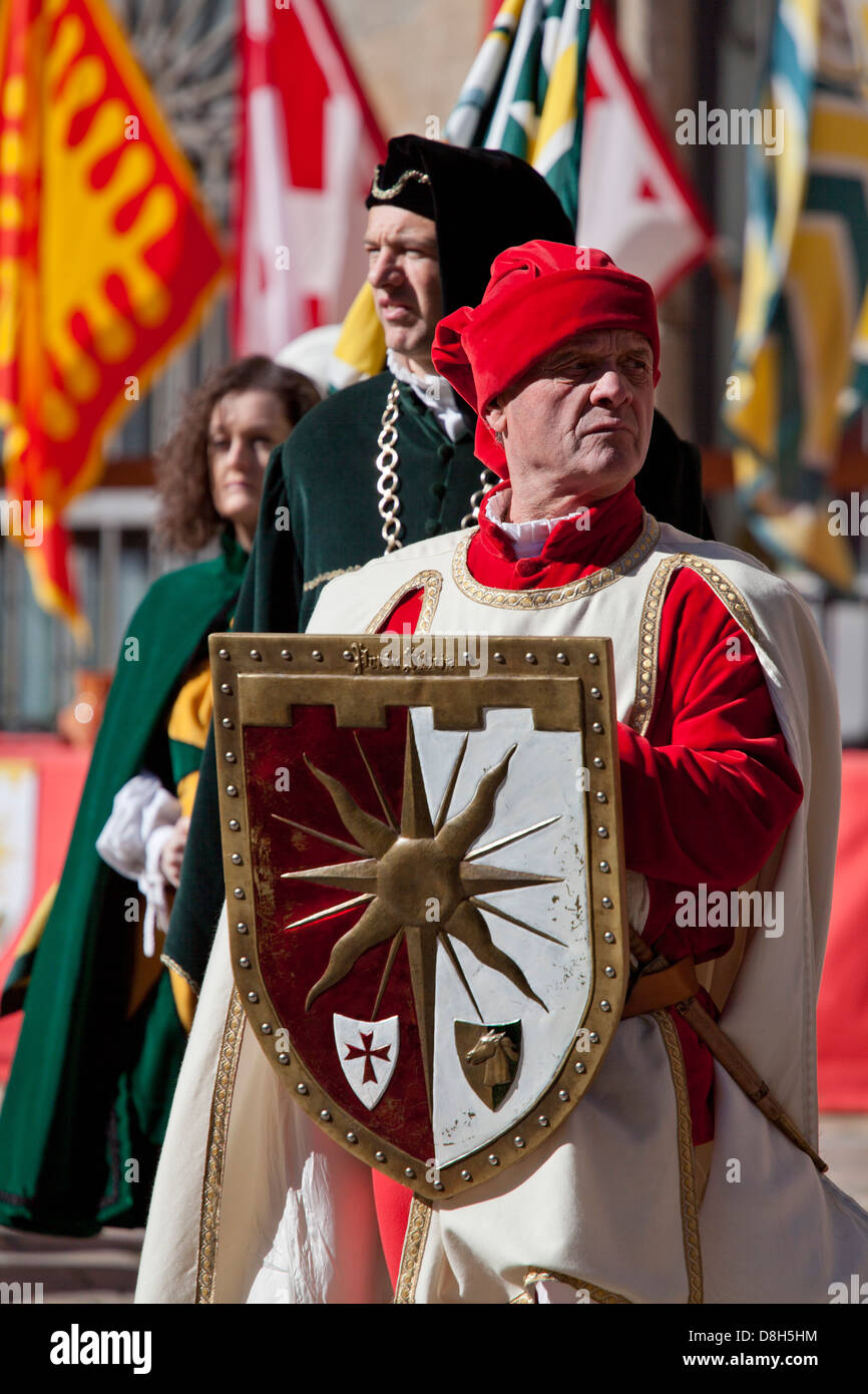 Local people in medieval costumes during traditional crossbow palio ...