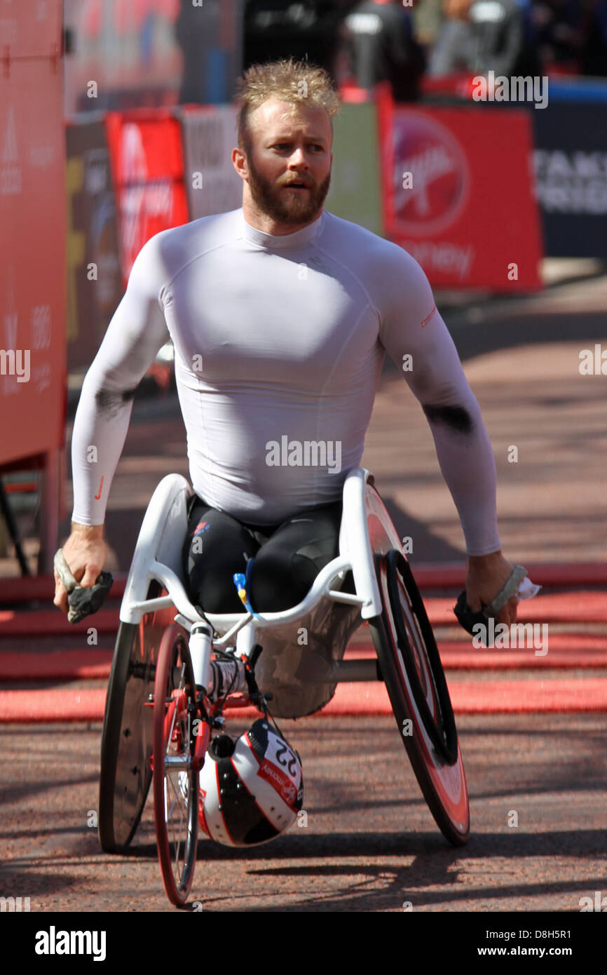 Josh Cassidy of Canada finishes the mens T54 2013 wheelchair Virgin ...