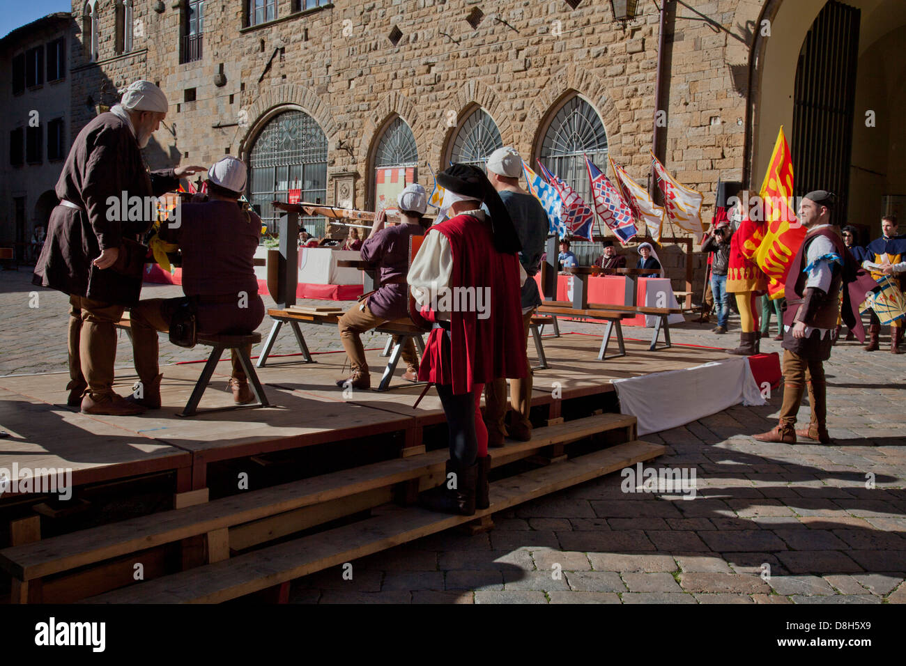Local people in medieval costumes during traditional crossbow palio ...