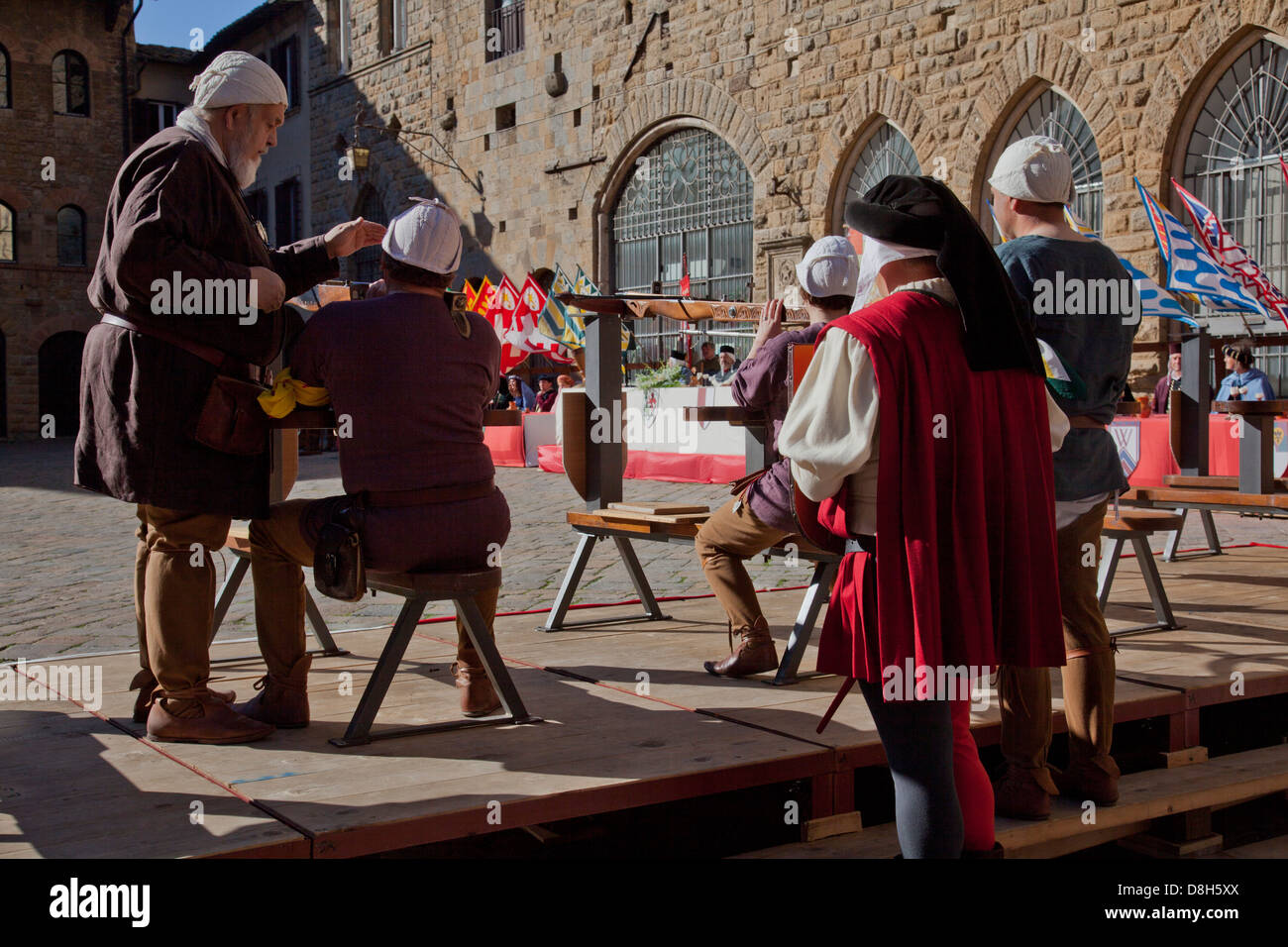 Local people in medieval costumes during traditional crossbow palio ...