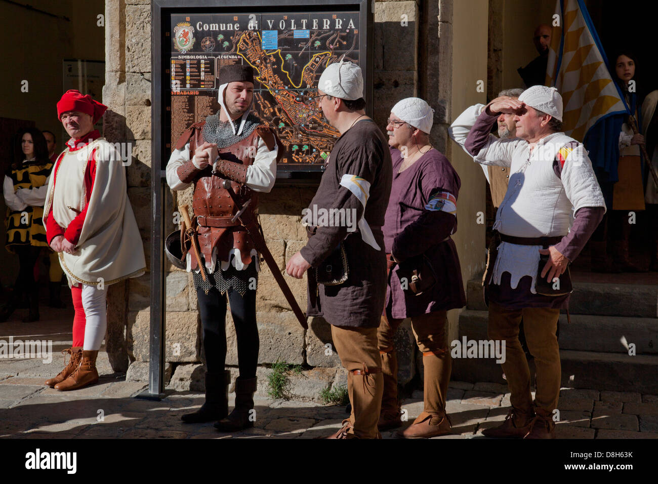Local people in medieval costumes during traditional crossbow palio ...