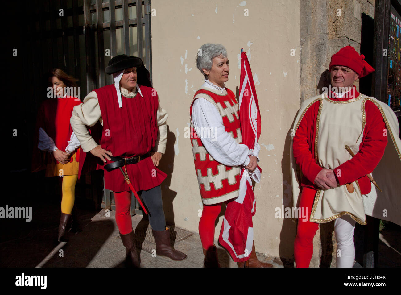 Local people in medieval costumes during traditional crossbow palio ...