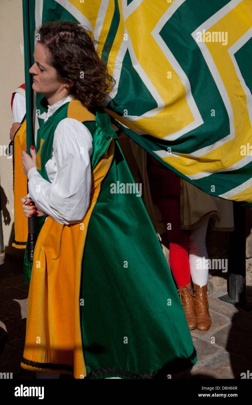 Local people in medieval costumes during traditional crossbow palio ...