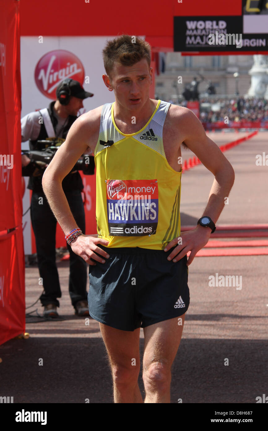 Derek HAWKINS of GB finishes the men's 2013 Virgin London Marathon ...
