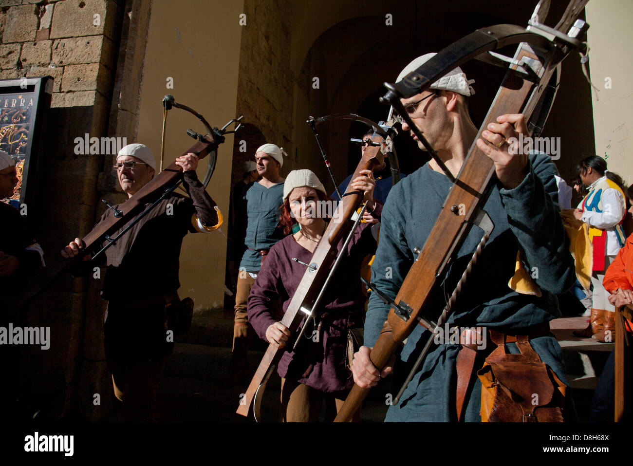 Local people in medieval costumes during traditional crossbow palio ...