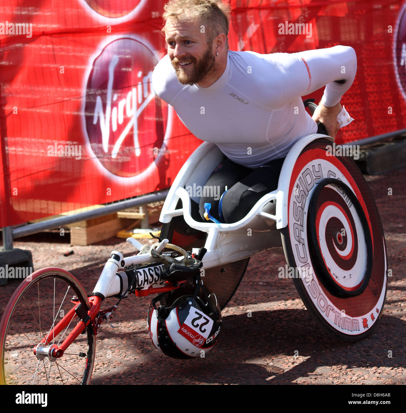 Josh Cassidy of Canada finishes the mens T54 2013 wheelchair Virgin ...
