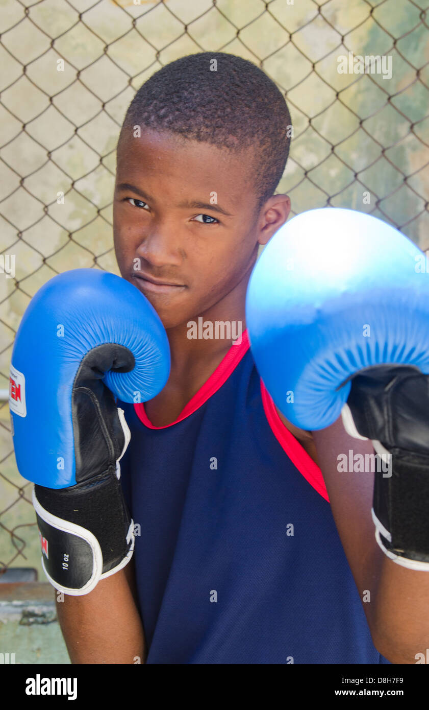 Havana Cuba young boxer in training with gloves at age 11 in gym ...