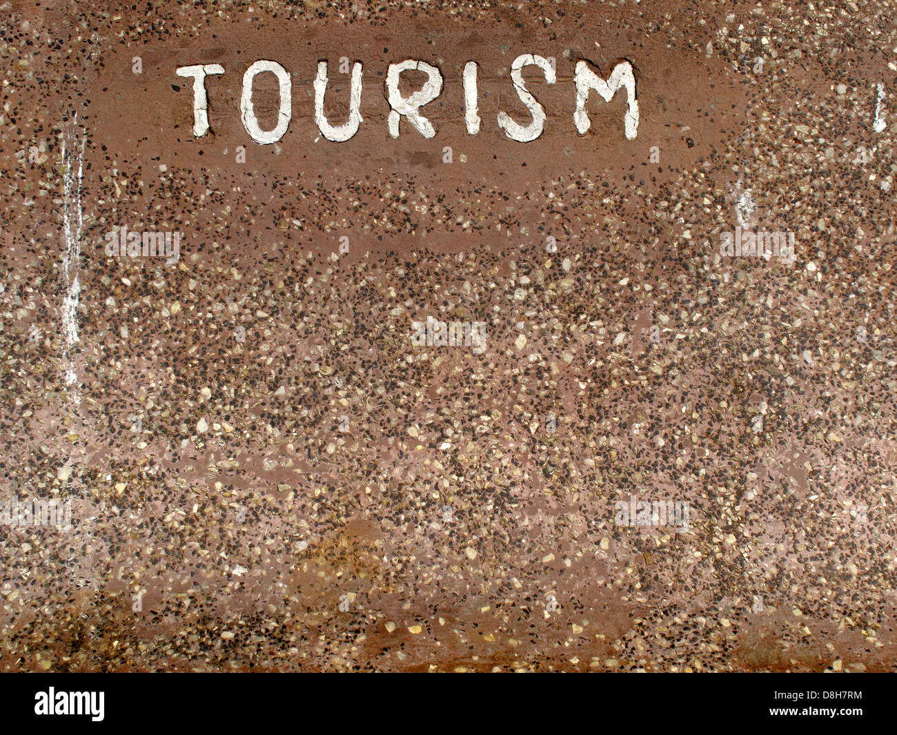 The word 'Tourism' carved into a stone bench, Goa, India Stock Photo ...