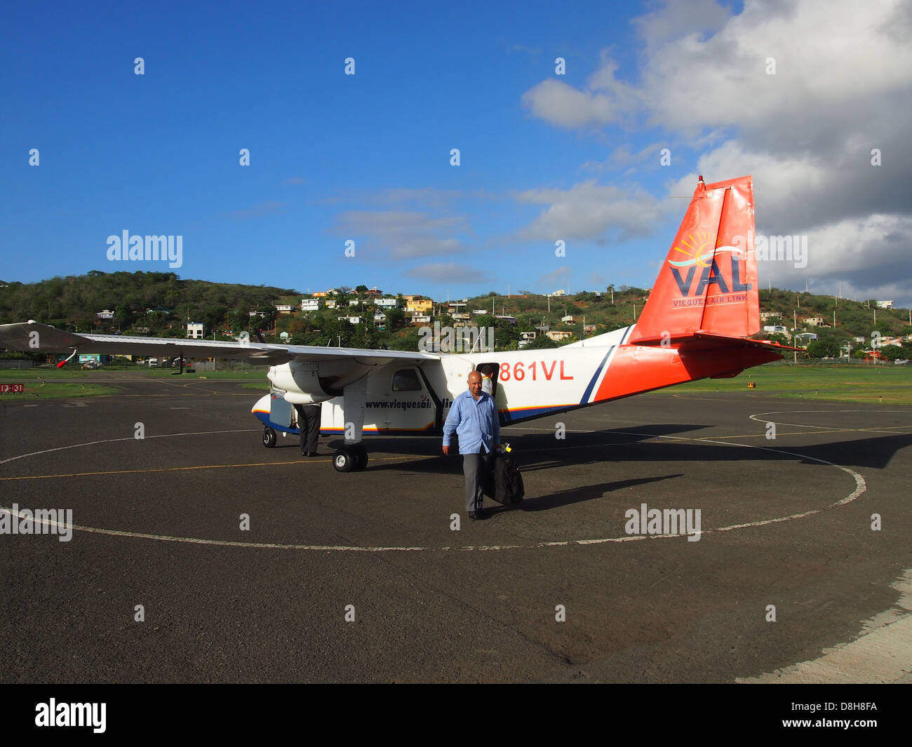 Getting off a small airplane Stock Photo - Alamy