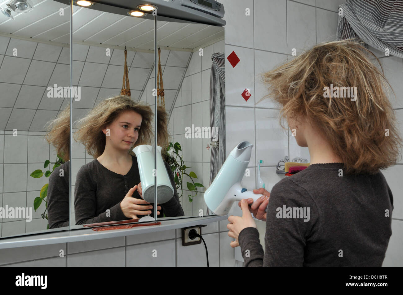Hair blonde blow dry hi-res stock photography and images - Alamy