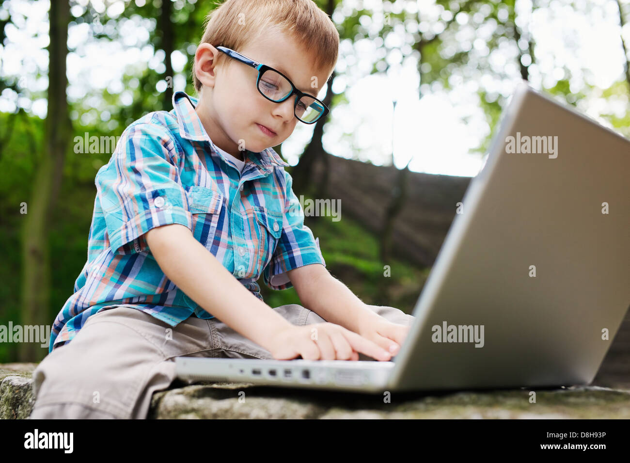 Young boy with notebook Stock Photo - Alamy