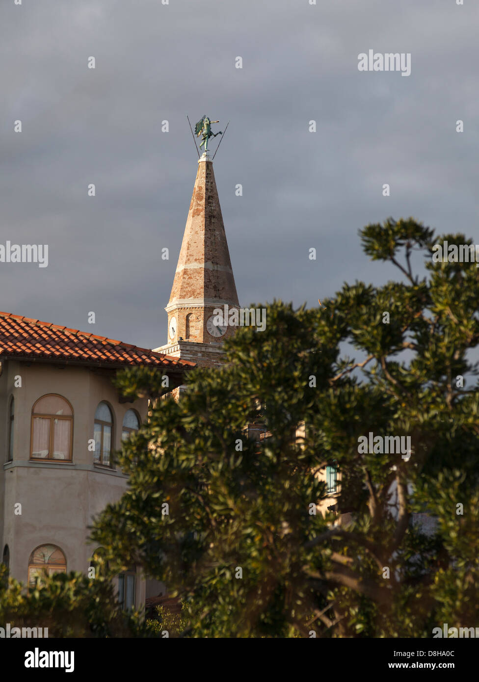 Grado, center town,Manor house and clock tower at sunset,Italy Stock ...