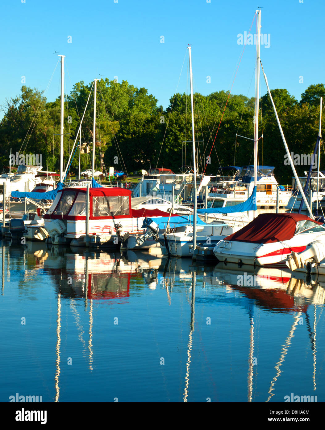 Boats docked vertical reflection water hi-res stock photography and ...