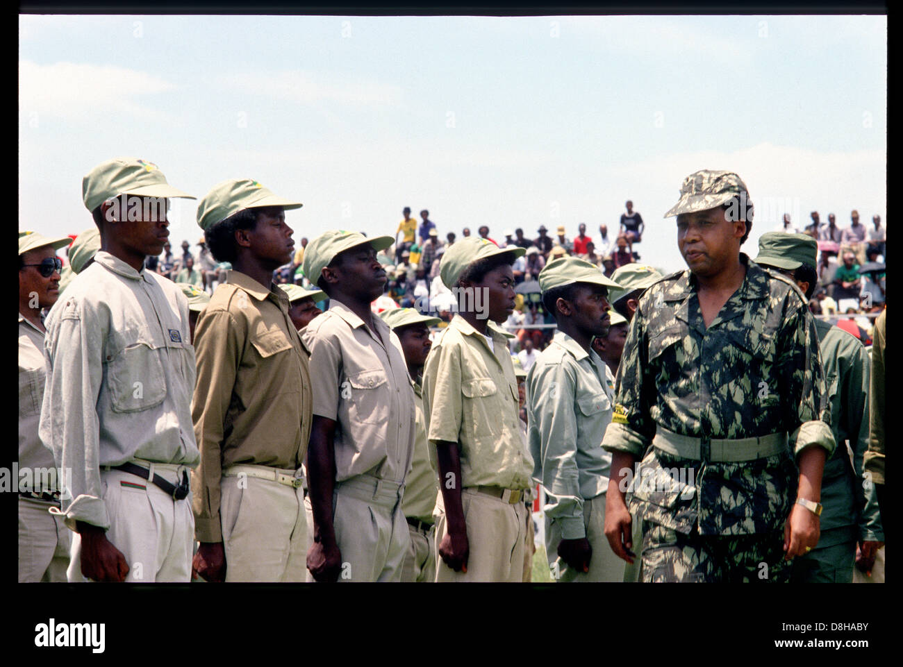 Chris Hani inspect Mk soldiers at an MK rally held at Langa Stadium ...