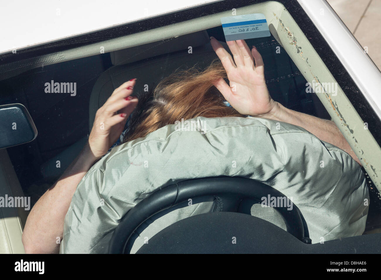 Woman in Car Accident with Inflated Airbag Stock Photo - Alamy