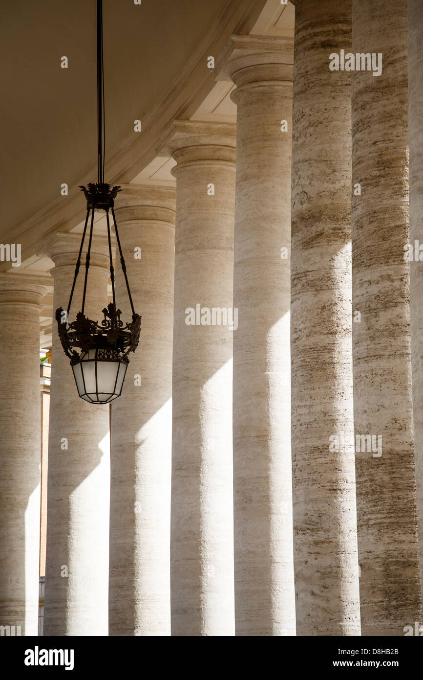 Old lamp and columns in Saint Peter's Square in Vatican City Stock ...