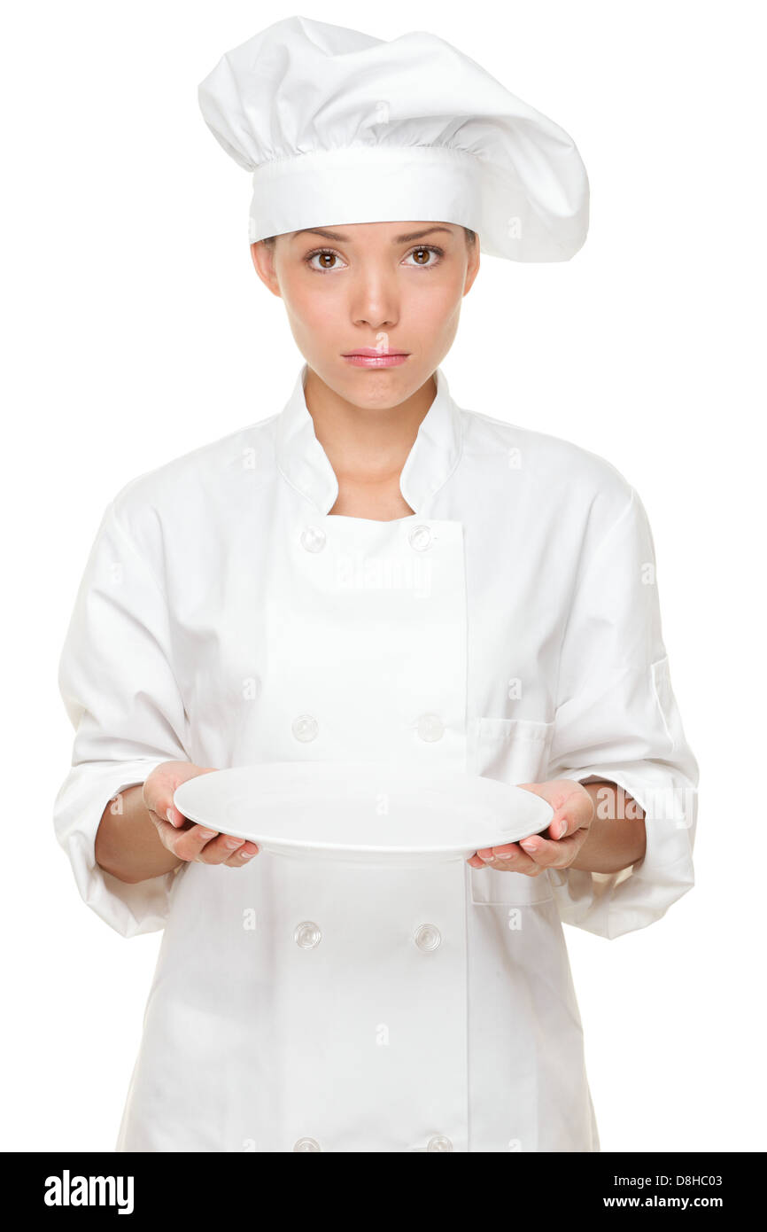 Chef disappointed and sad with empty plate. Woman chef serving empty ...