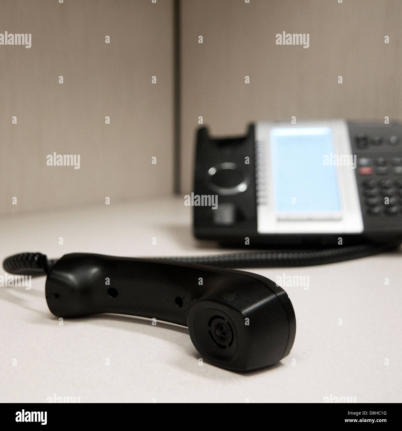 Office multi-line telephone with phone off the hook Stock Photo - Alamy