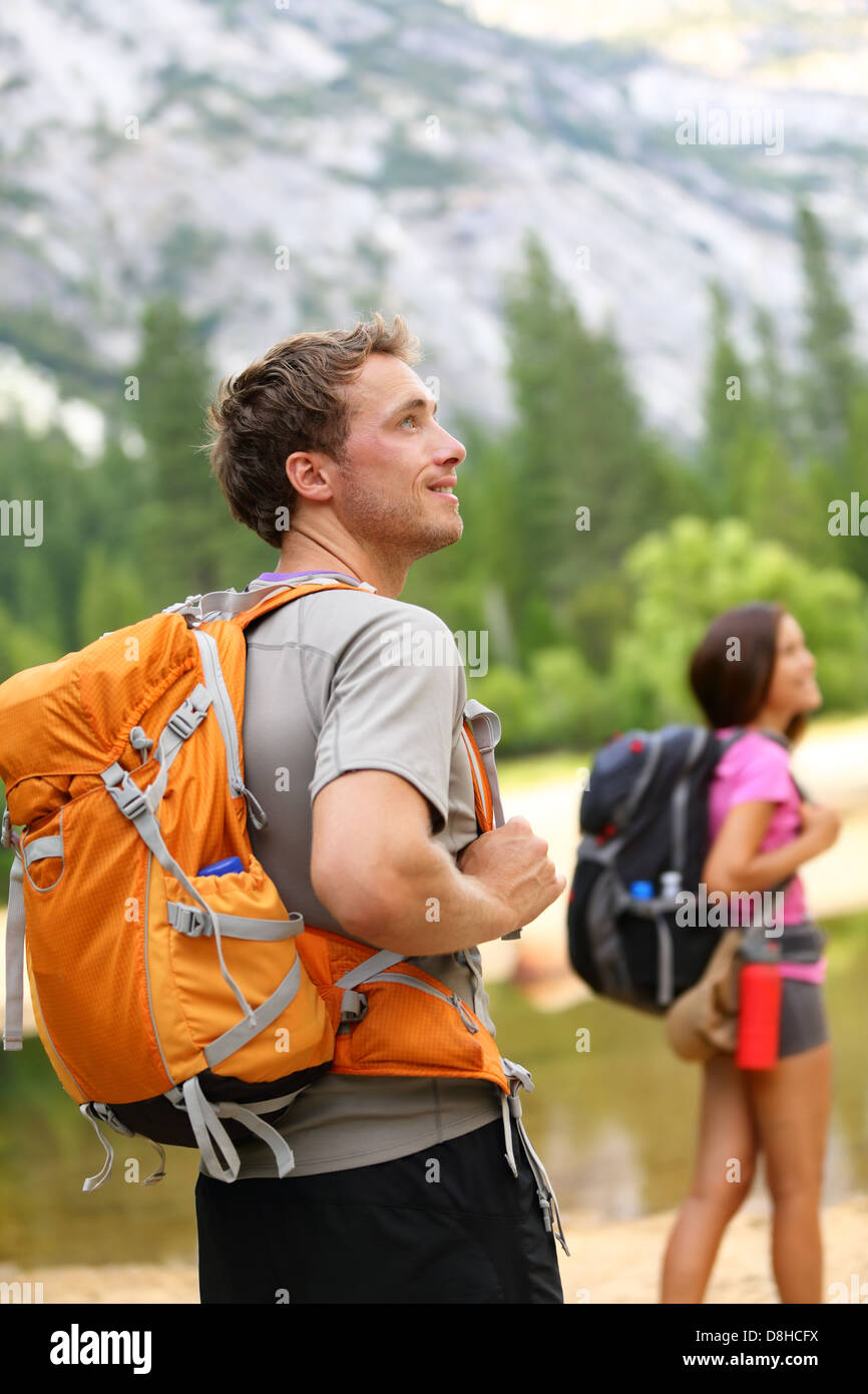 Hiking people - man hiker looking at landscape nature with mountains ...