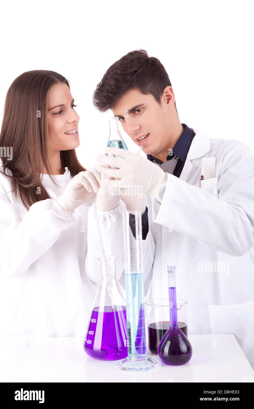 Team of young scientists at laboratory Stock Photo - Alamy