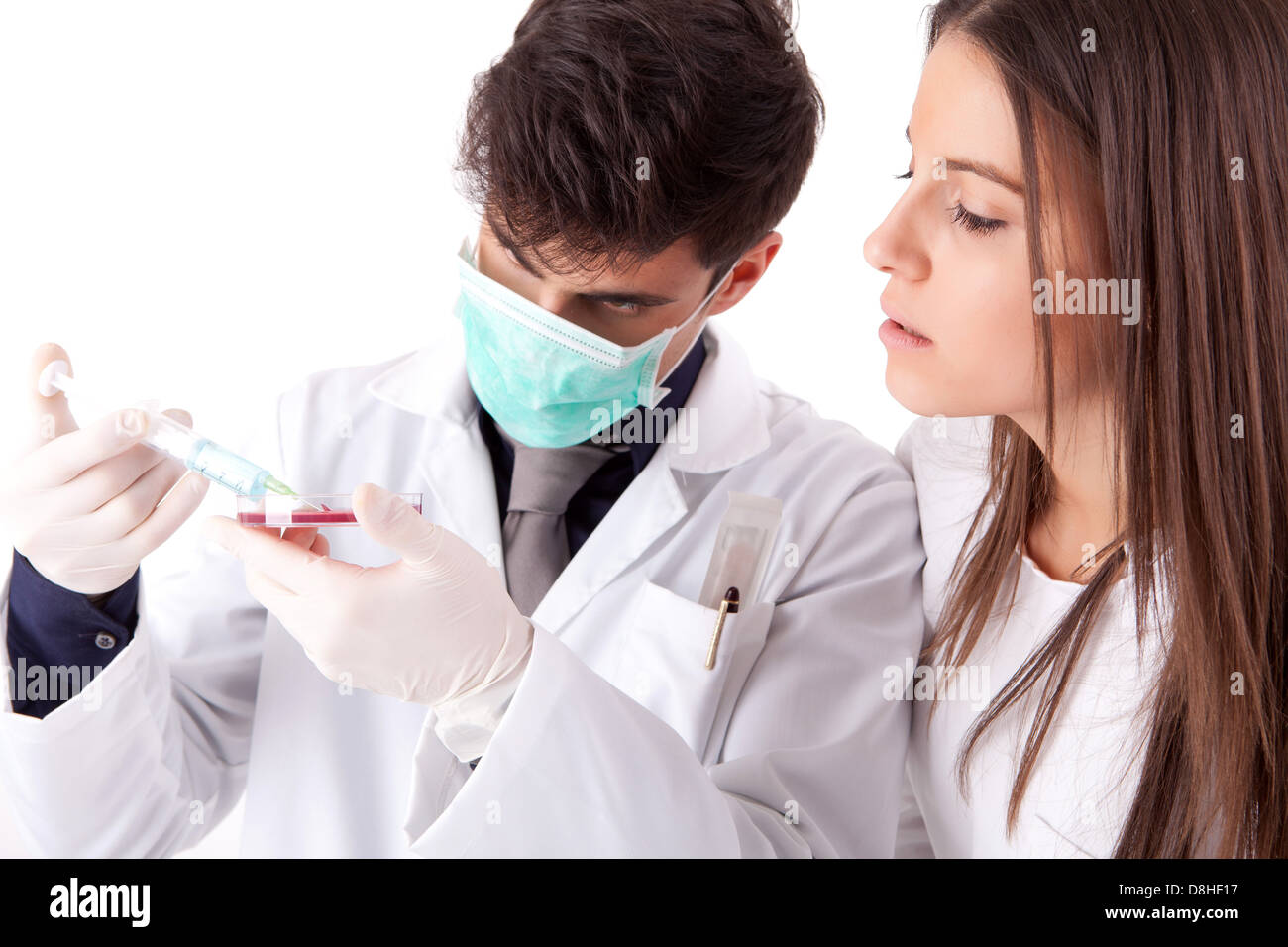 Team of young scientists at laboratory Stock Photo - Alamy