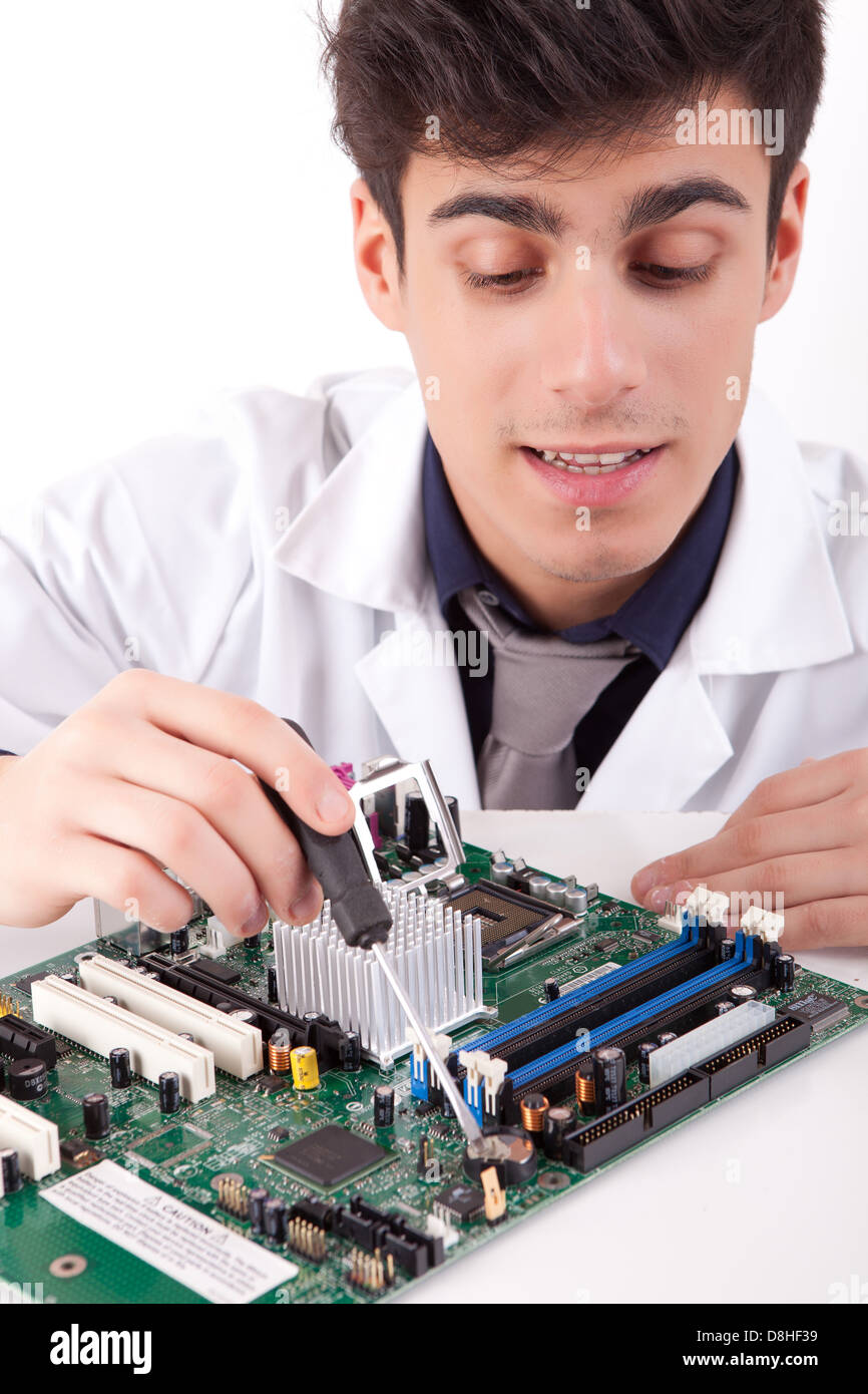 Computer engineer working on an old motherboard Stock Photo - Alamy