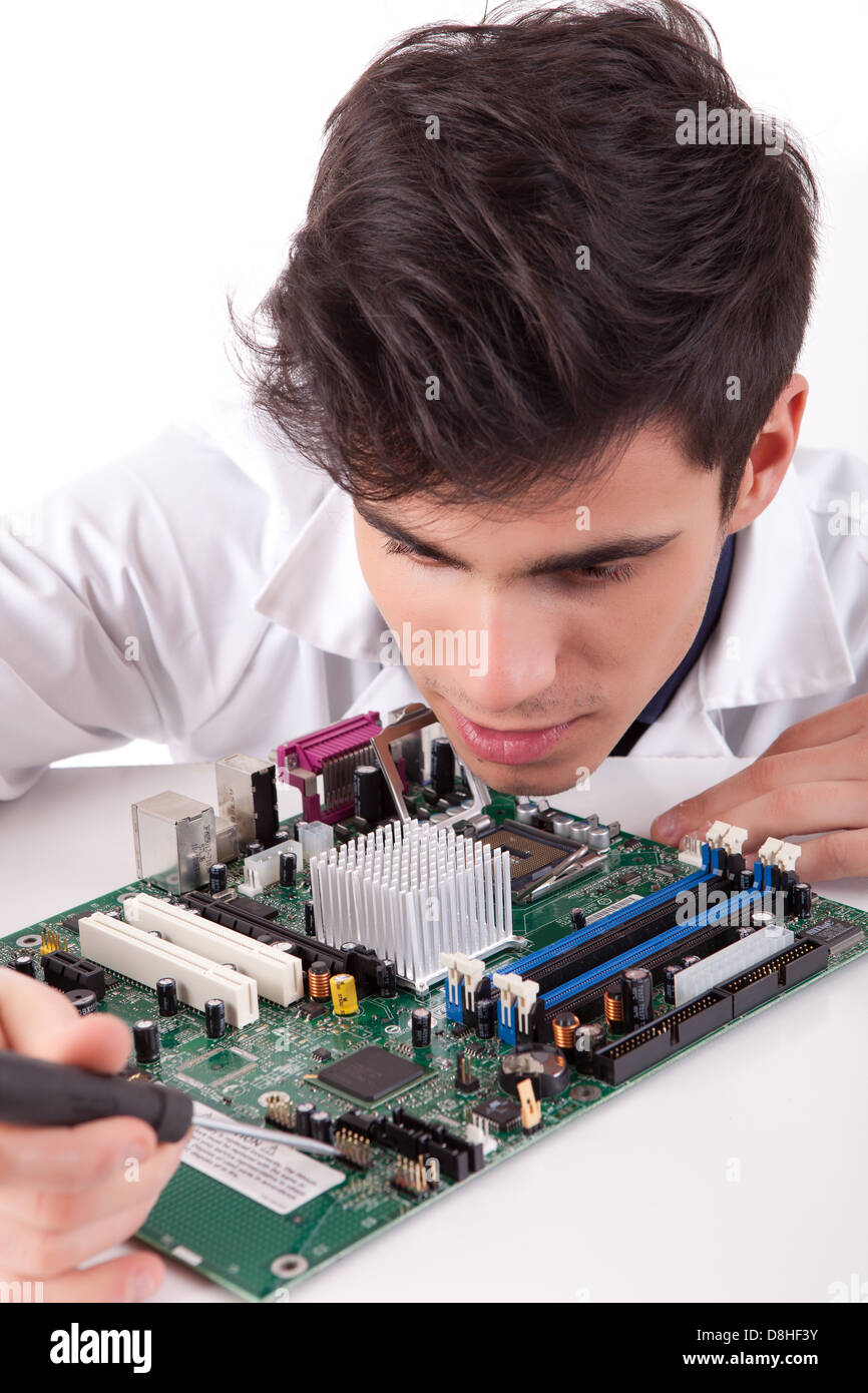 Computer engineer working on an old motherboard Stock Photo - Alamy