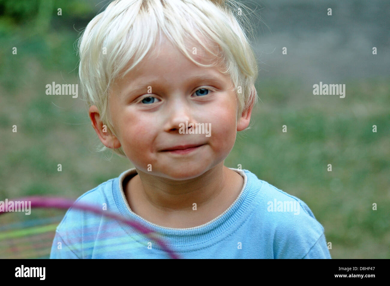 Young boy playing badminton Stock Photo - Alamy