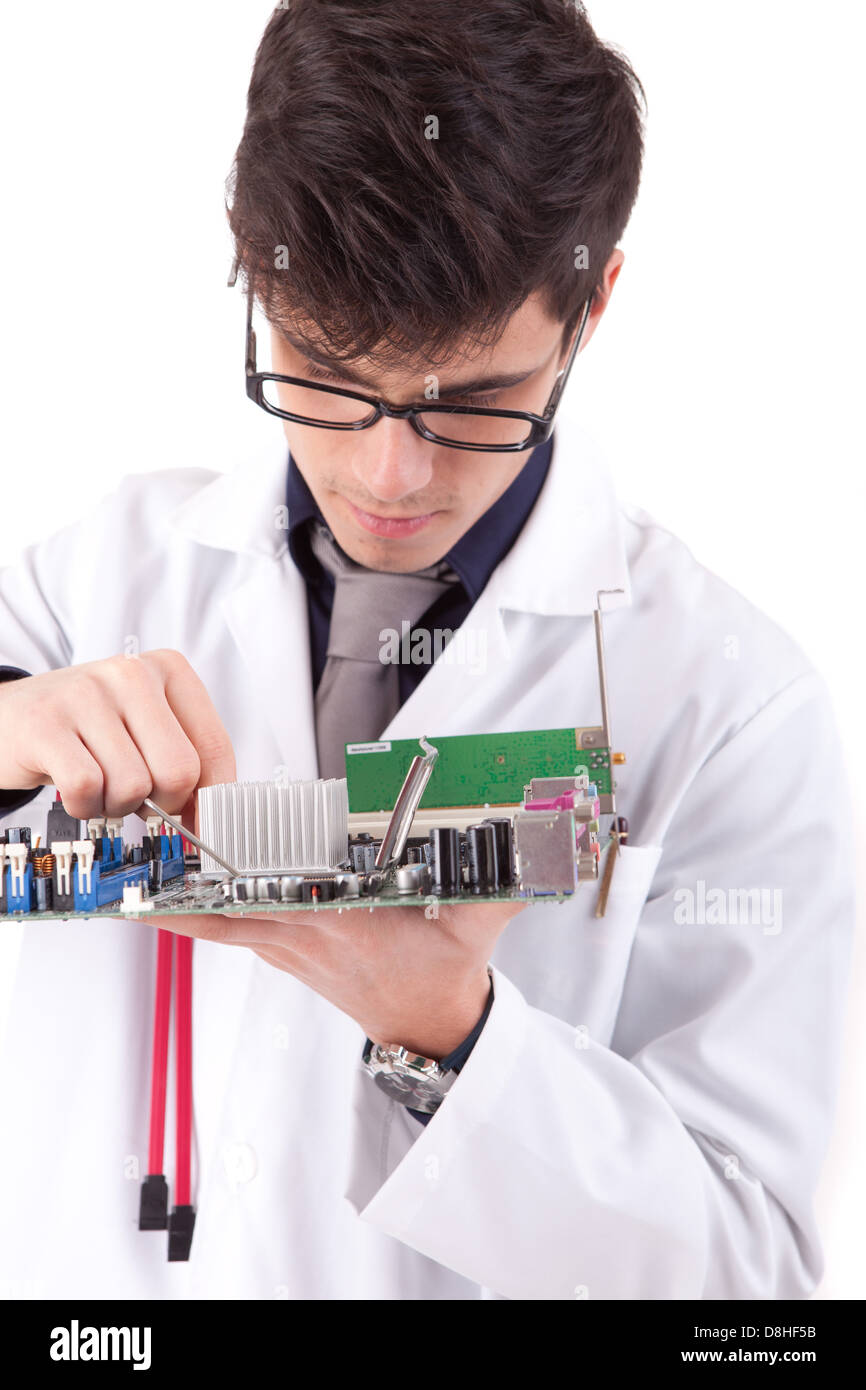 Computer engineer working on an old motherboard Stock Photo - Alamy