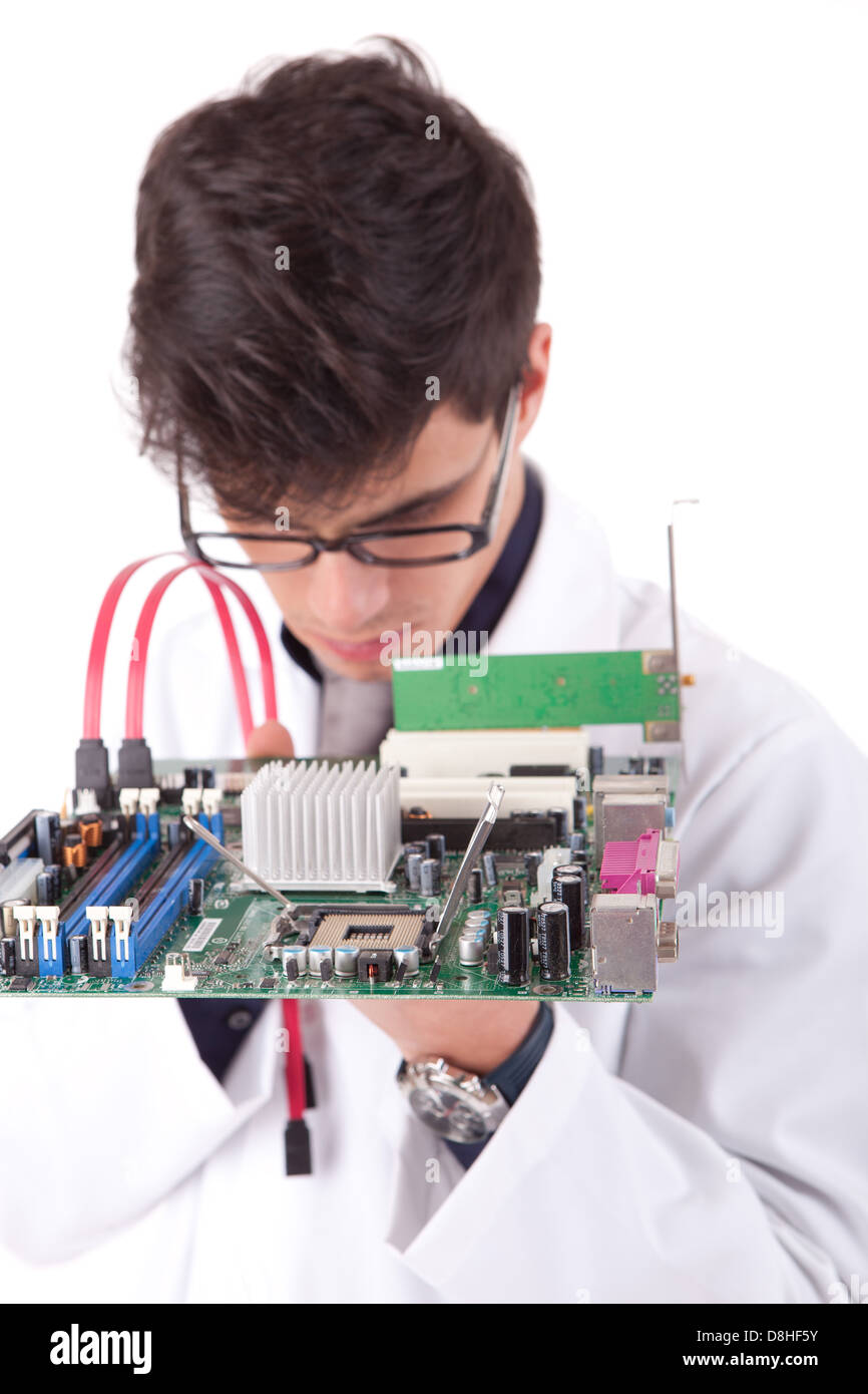 Computer engineer working on an old motherboard Stock Photo - Alamy