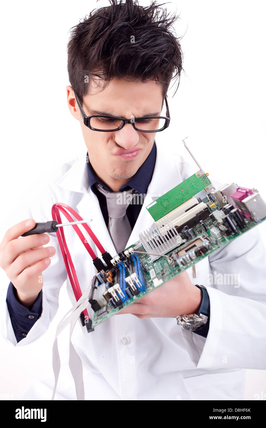 Computer engineer working on an old motherboard Stock Photo - Alamy