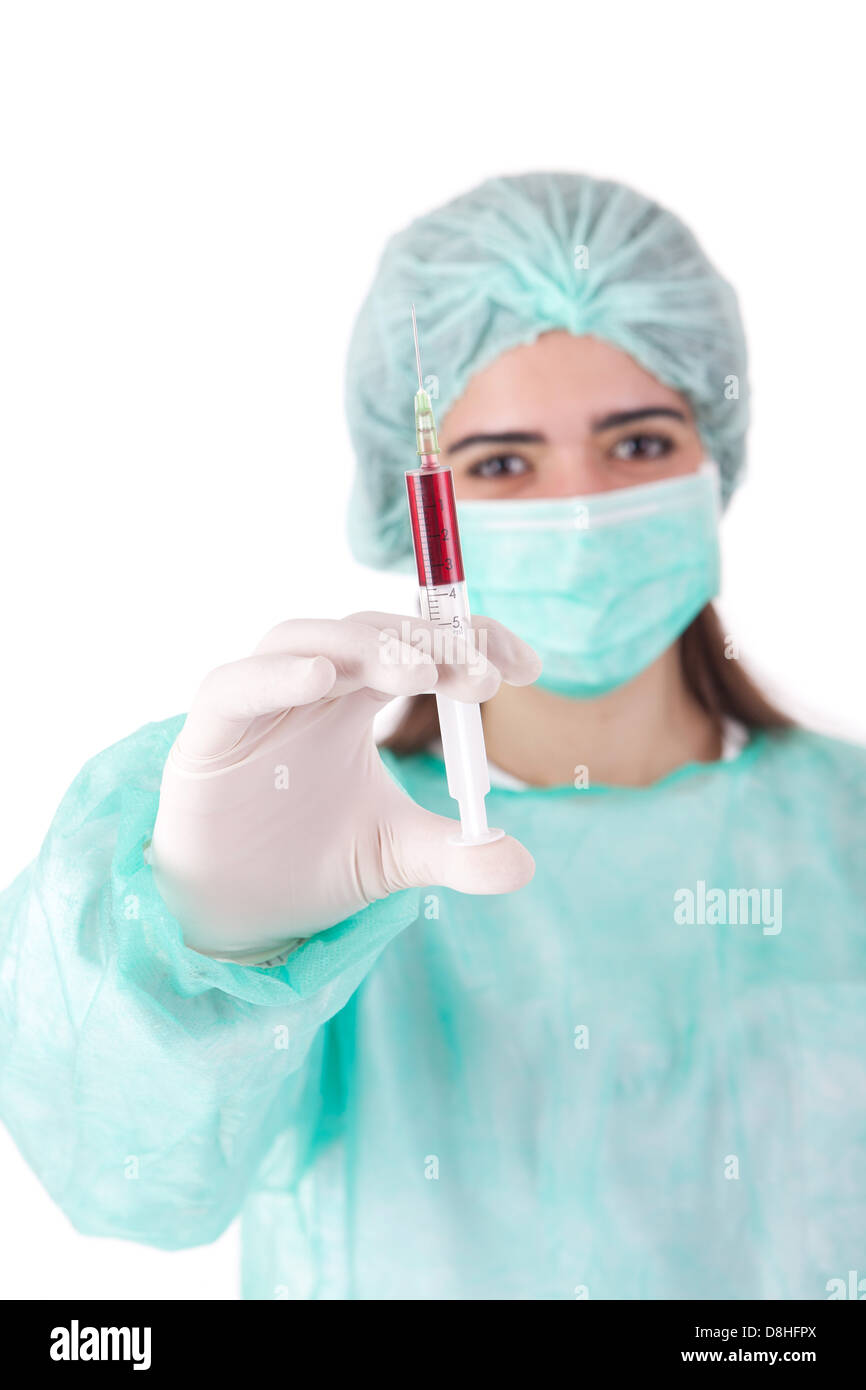 Young nurse holding a syringe Stock Photo - Alamy