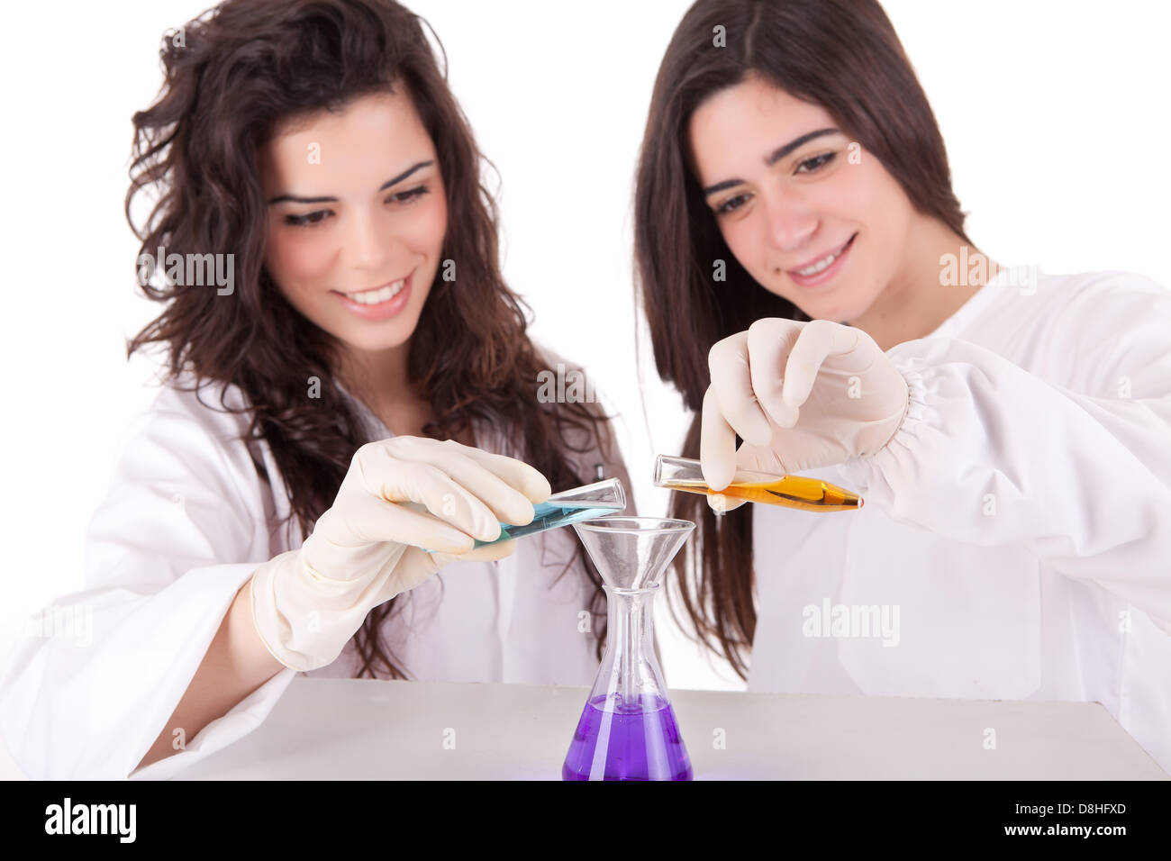 Team of young scientists at laboratory Stock Photo - Alamy