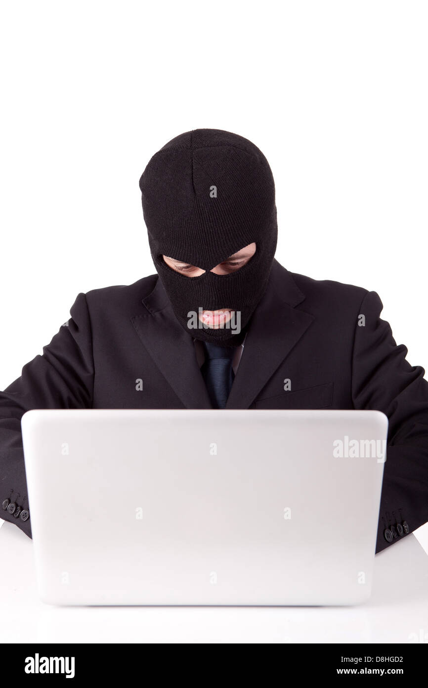Disguised computer hacker Stock Photo - Alamy