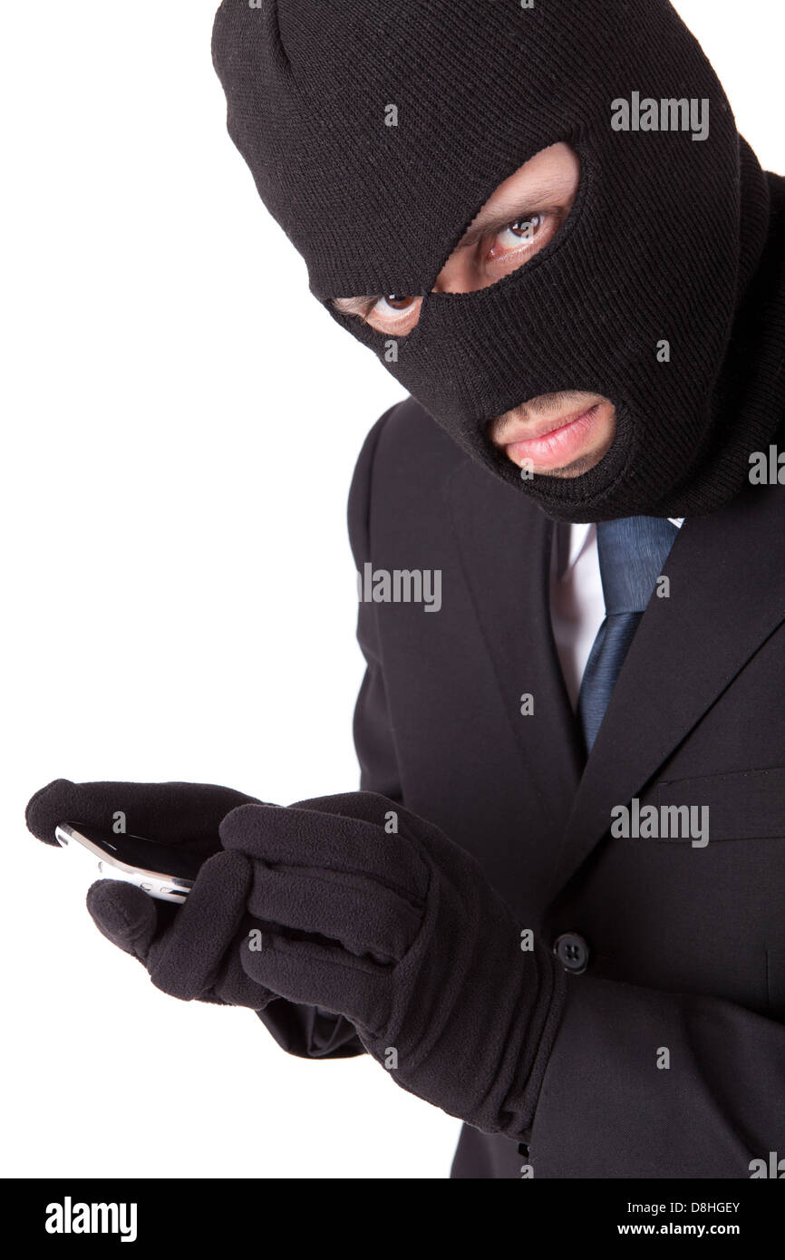 Disguised computer hacker Stock Photo - Alamy