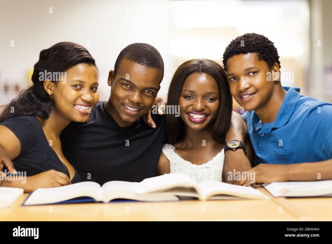 group of african american college students in library Stock Photo - Alamy