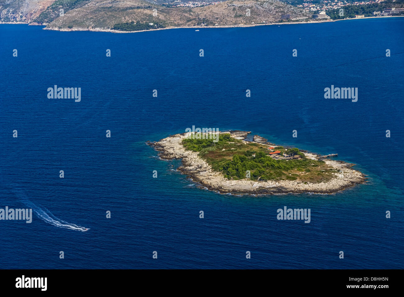 Aerial helicopter shoot of island Supetar in front of Cavtat town ...