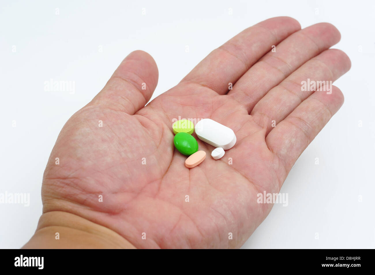 Hand with pills Stock Photo - Alamy