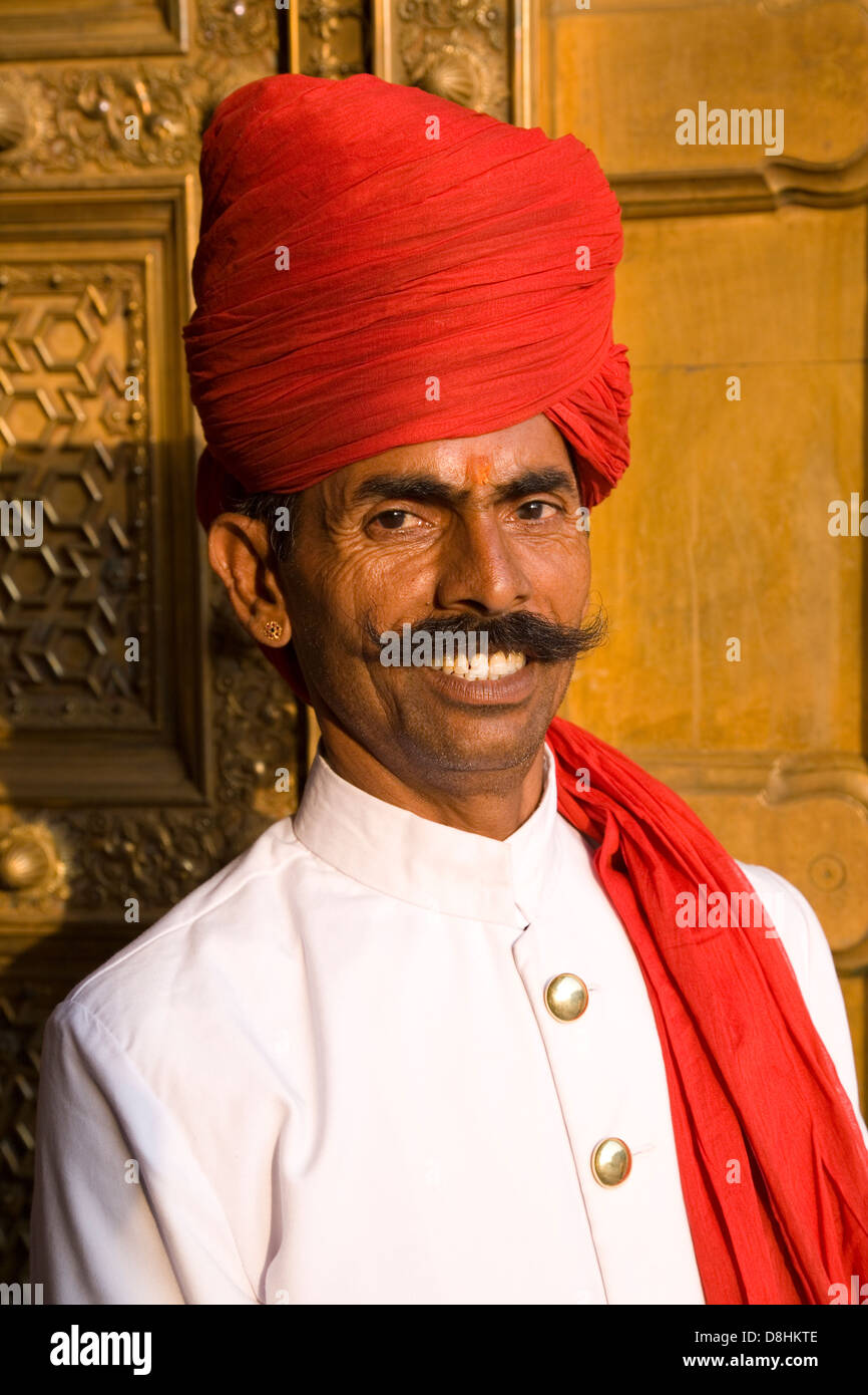 India, Rajasthan, Jaipur, City Palace complex, Palace guard wearing a ...