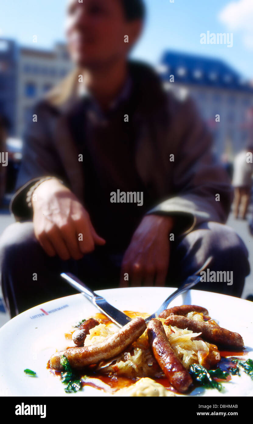 man eating sausage Stock Photo - Alamy