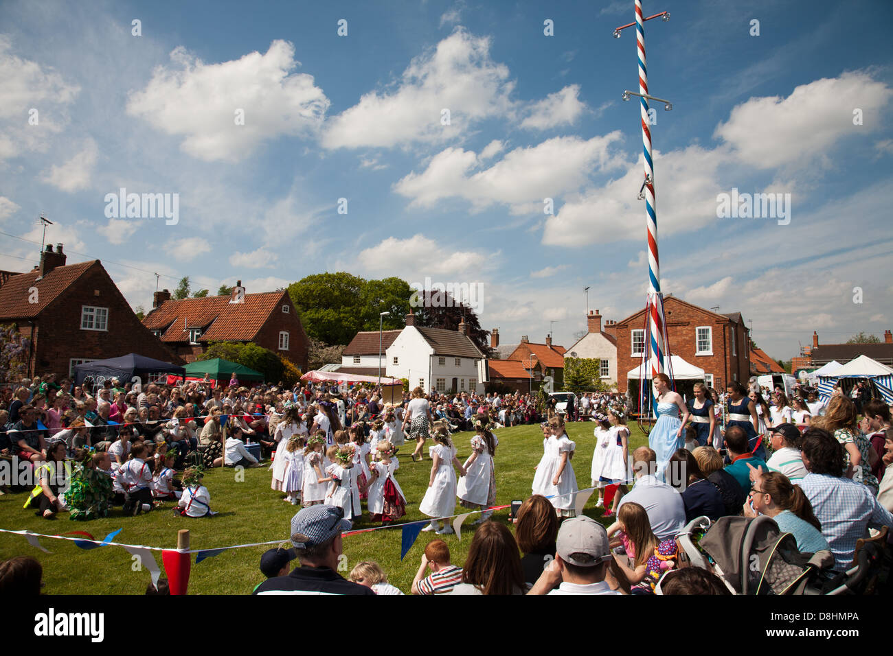 Dancing Round The Maypole On The Village Green High Resolution Stock ...
