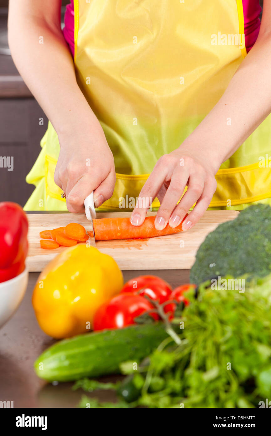 Woman vegetable cut finger hi-res stock photography and images - Alamy