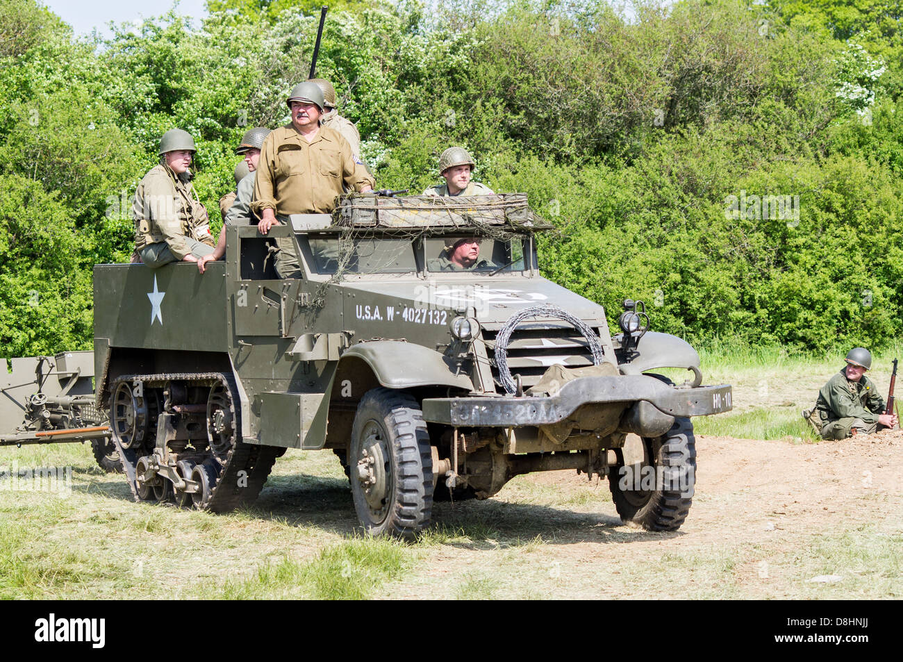 American soldiers being carried in a half track personnel carrier ...