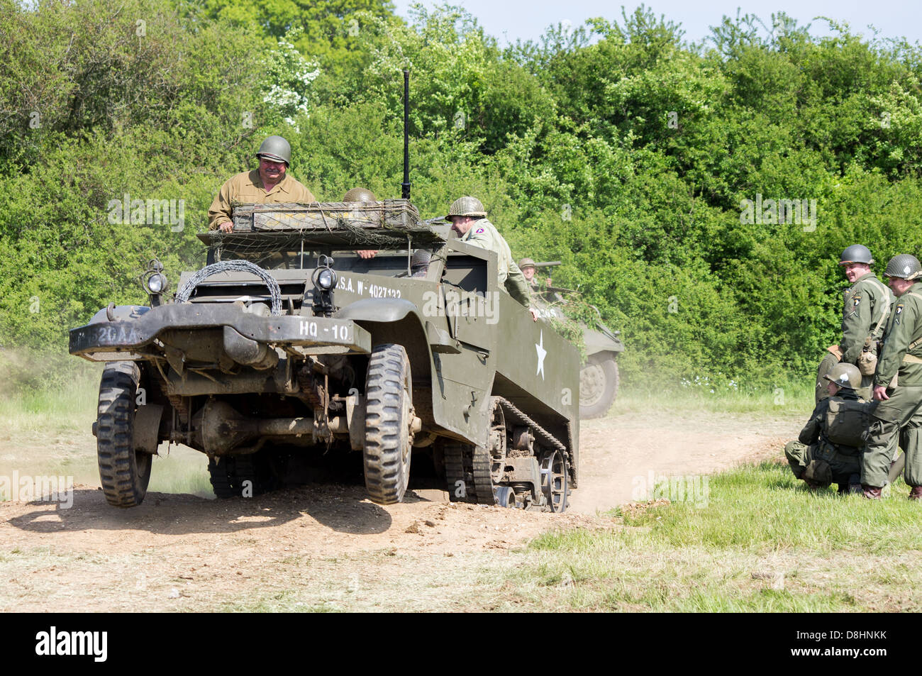 American soldiers being carried in a half track personnel carrier ...