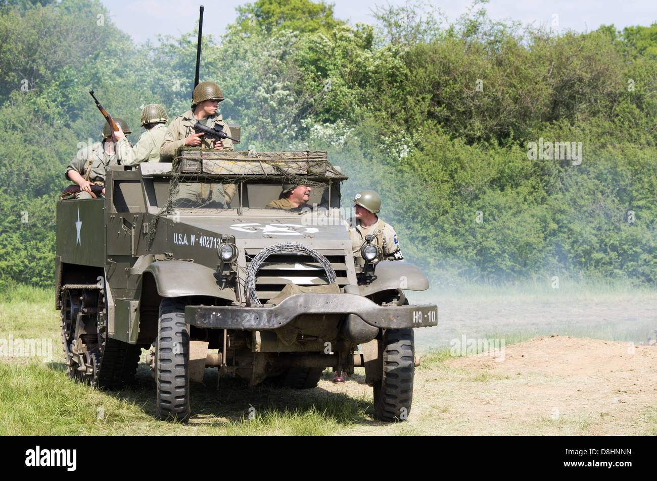 American soldiers being carried in a half track personnel carrier ...