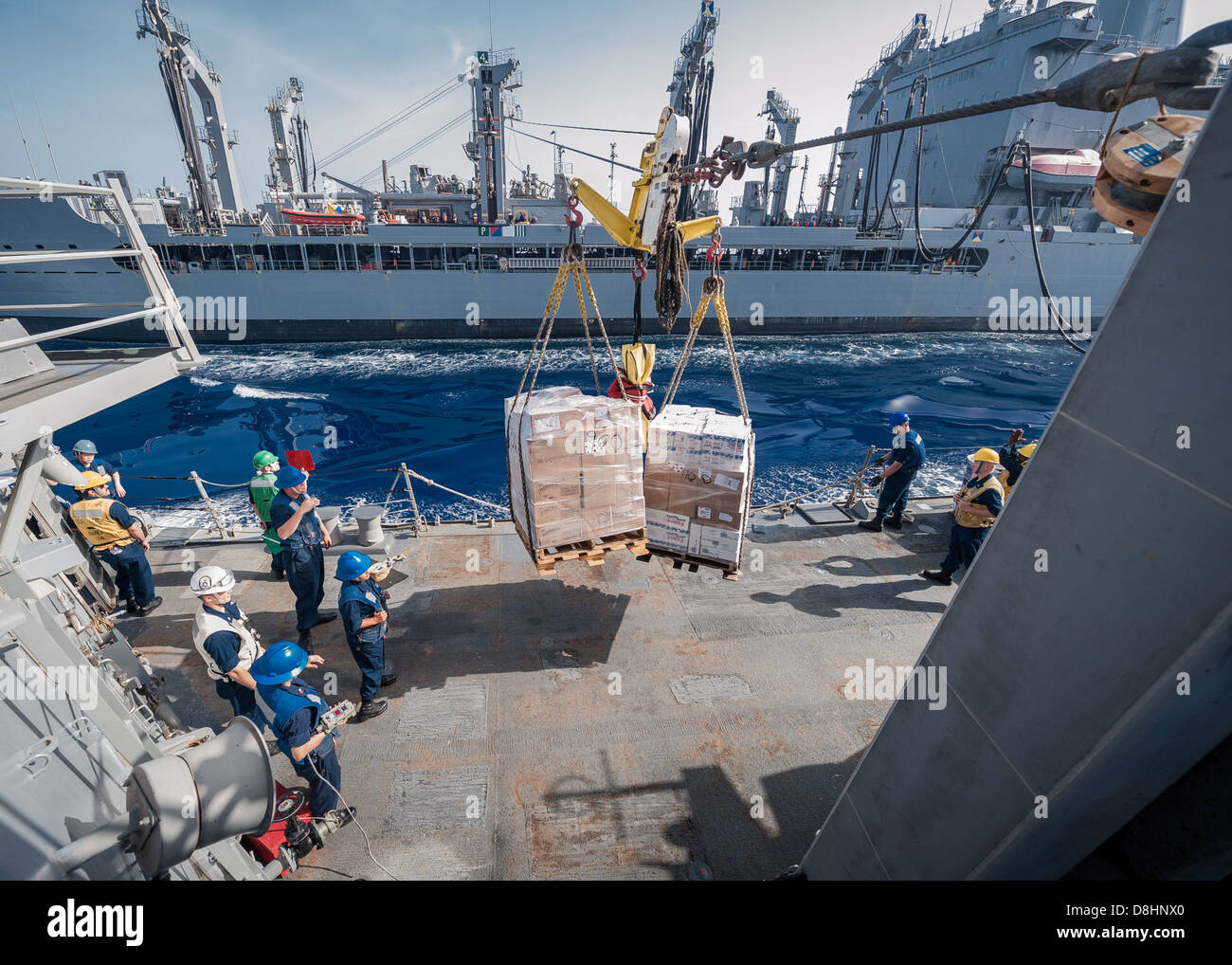 Ships conduct replenishment-at-sea Stock Photo - Alamy